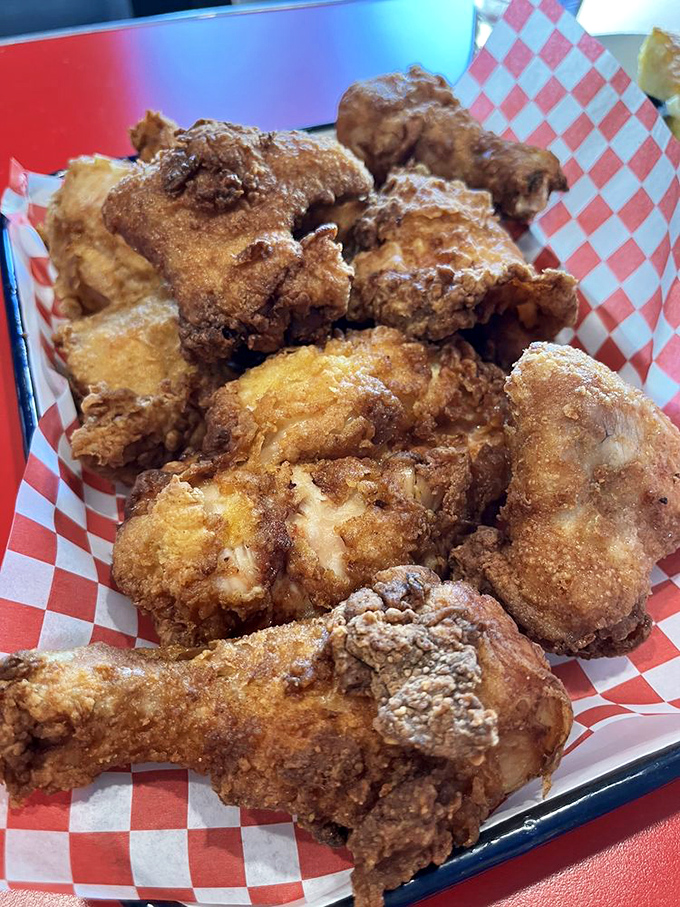Golden-brown fried chicken that would make your grandmother both jealous and proud. The kind of crispy that makes a satisfying sound.