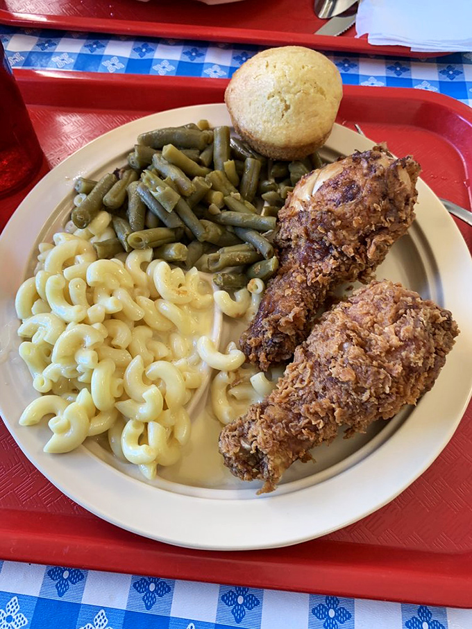 Fried chicken that's achieved the impossible trifecta: golden-crisp exterior, juicy interior, and the power to silence a table of chatty diners.