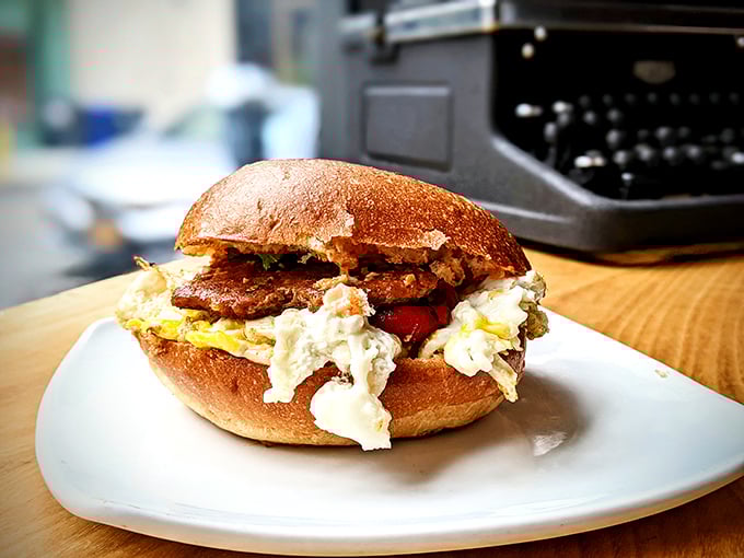 Breakfast sandwich nirvana achieved: golden bread cradling eggs and meat in perfect harmony. The kind of morning fuel that makes Monday feel like Saturday.