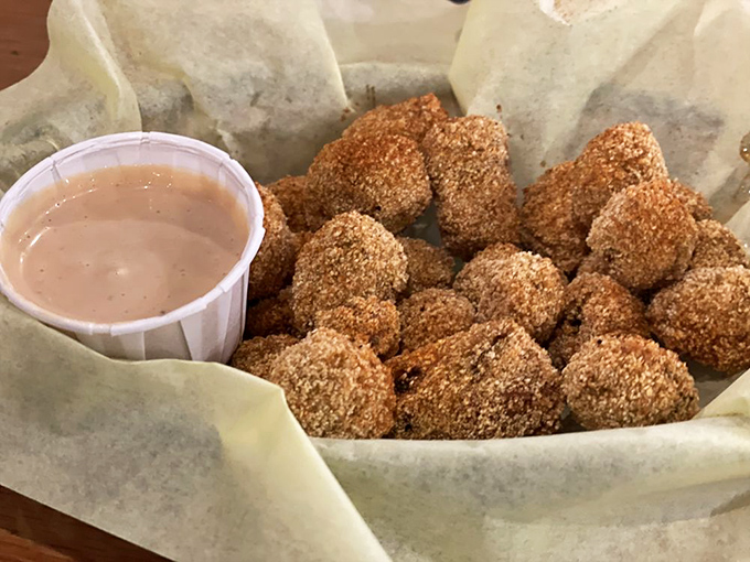 Golden fried okra that proves vegetables can be just as addictive as any barbecue when done right.