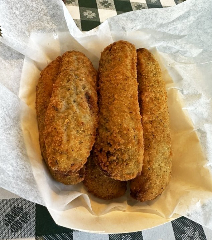 Fried pickles: where tangy cucumber meets crispy batter in a relationship that works better than most Hollywood marriages. The perfect opening act to the chicken main event.