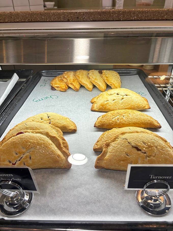 These hand-held fruit pies aren't just desserts, they're edible treasure chests of perfectly spiced filling wrapped in pastry that shatters just right.