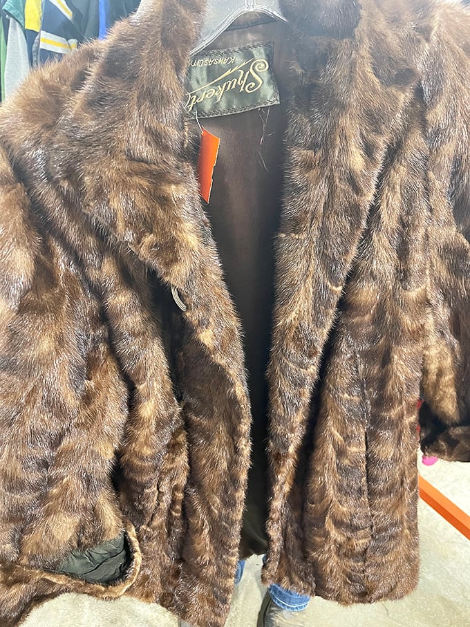 Fur real? This vintage coat waits patiently for its second act. Someone's grandmother's pride and joy is about to become someone's ironic winter statement piece.