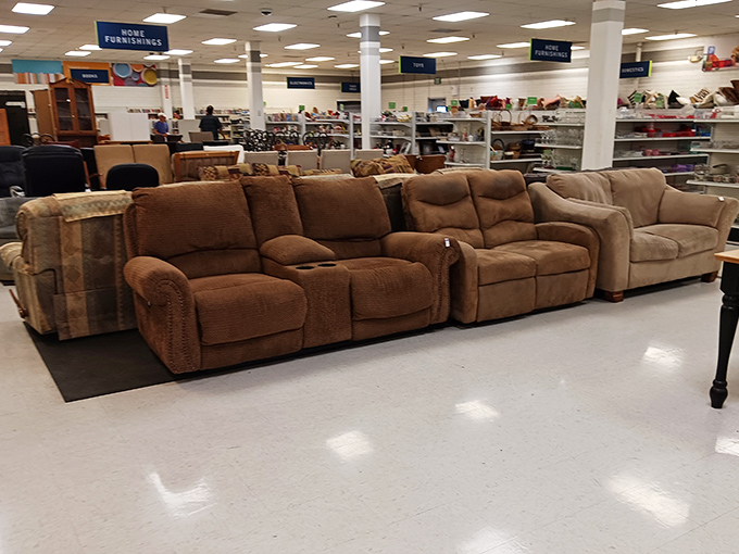 Recliners and sofas lined up like hopeful contestants on a dating show, each one whispering, "Take me home, I promise to be comfortable!"