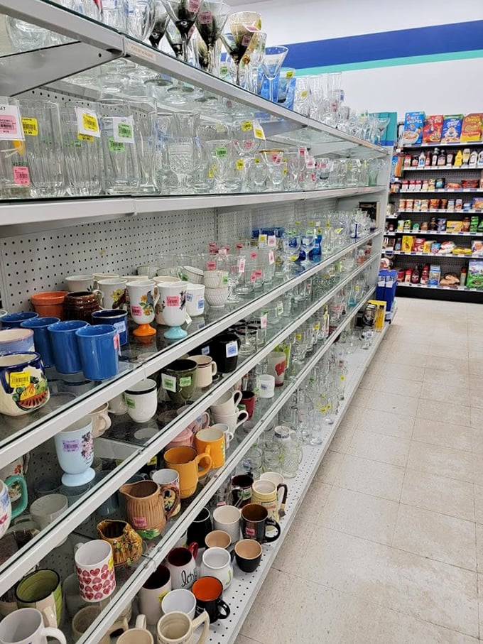 Crystal clear opportunities line these shelves. Vintage glassware collectors know this aisle is where patience and persistence pay off in spectacular finds.