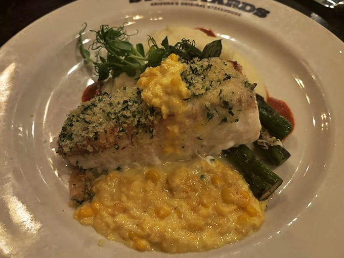 Seafood might seem surprising at a steakhouse, but this herb-crusted fish with creamy corn proves The Stockyards isn't just a one-trick pony.
