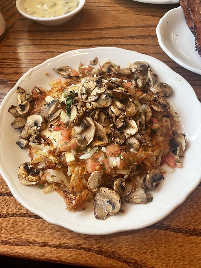 This isn't just a hash brown&mdash;it's a mushroom-topped masterpiece that makes you question why potatoes ever agreed to be prepared any other way.