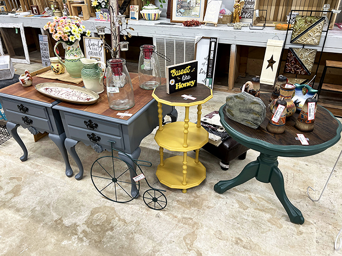 That yellow tiered stand between two refinished tables is the furniture equivalent of finding an unexpected twenty in your winter coat pocket.