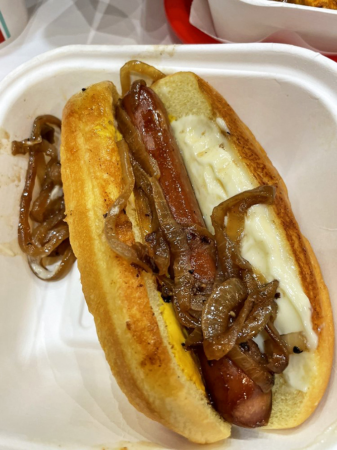 Hot dogs achieve their highest purpose when topped with caramelized onions&mdash;a symphony of snap, sweetness, and savory satisfaction in every bite.