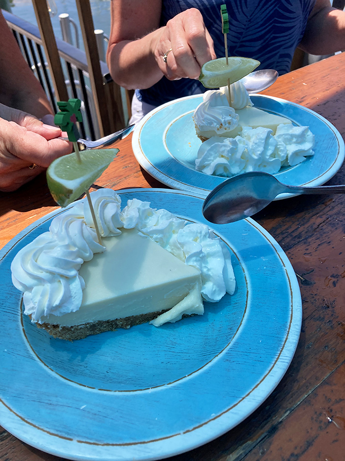 Key lime pie that makes grown adults fight over the last bite. Creamy, tart perfection topped with clouds of whipped cream.