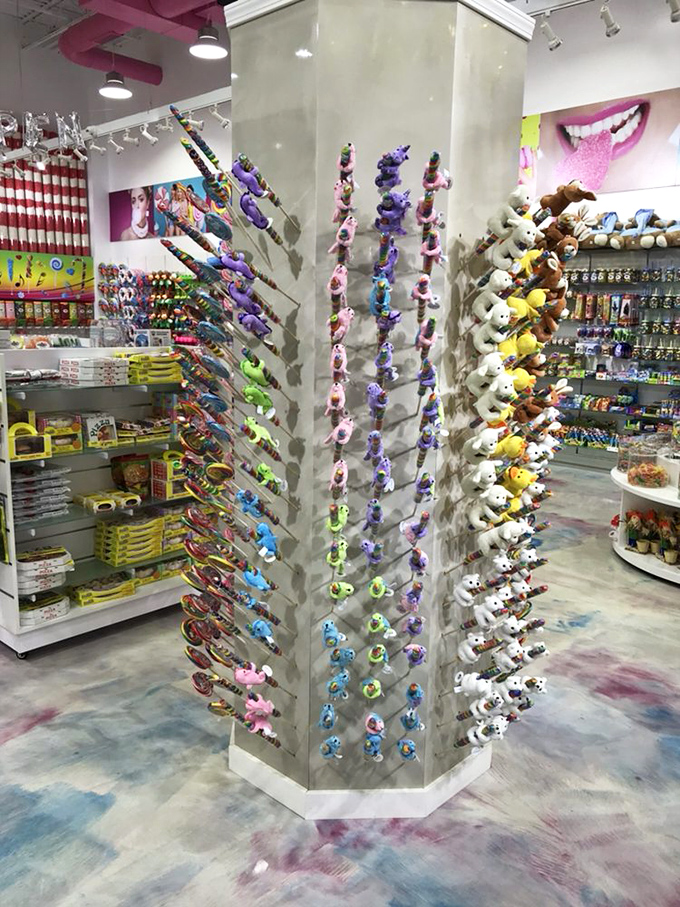 The lollipop display tower features enough colors to make a rainbow jealous and enough sugar to power a kindergarten class for days.