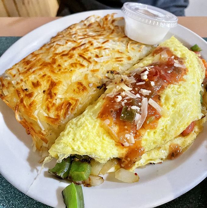 This isn't just an omelet&mdash;it's an architectural masterpiece of eggs, cheese, and salsa that makes chain restaurants weep with inadequacy.