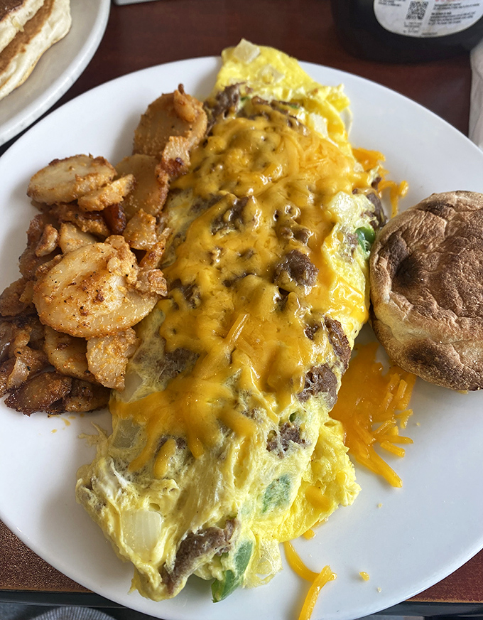 An omelet that doesn't just contain cheese&mdash;it embraces it in a warm, gooey bear hug that says "good morning" in the most delicious way.