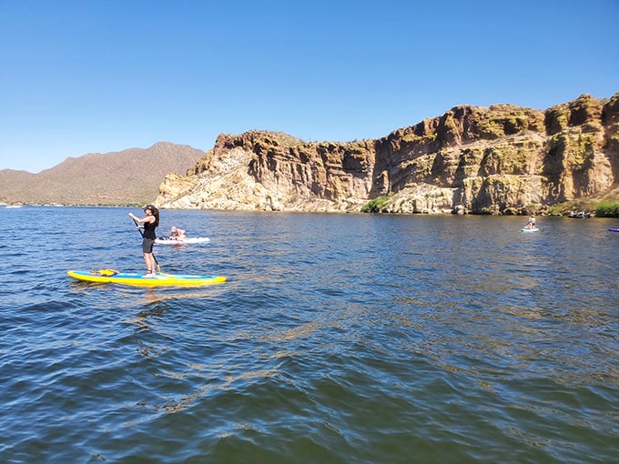 Paddleboarding &ndash; where yoga meets surfing meets "please don't let me fall in front of everyone." The ultimate test of balance with a reward of panoramic desert views.