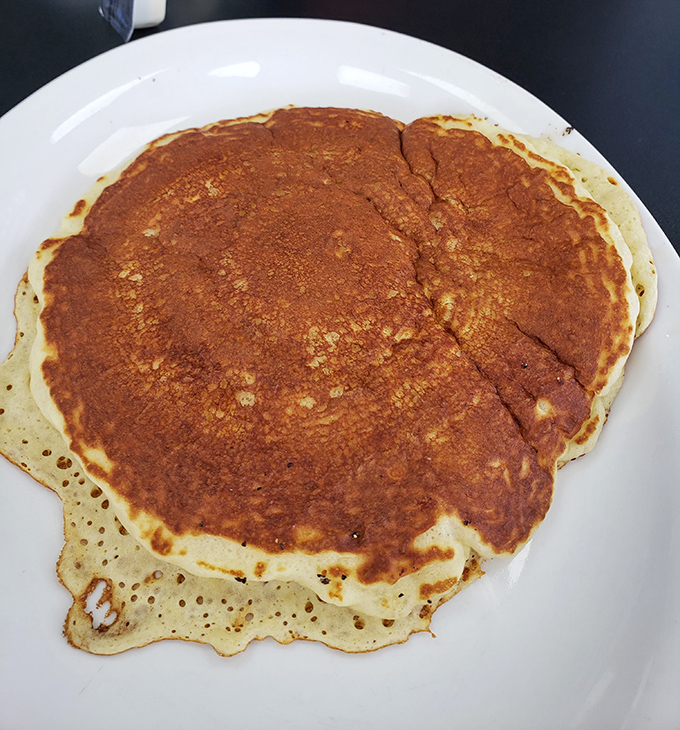 The pancake that launched a thousand road trips. Golden, fluffy, and bigger than your plate&mdash;just as breakfast gods intended.