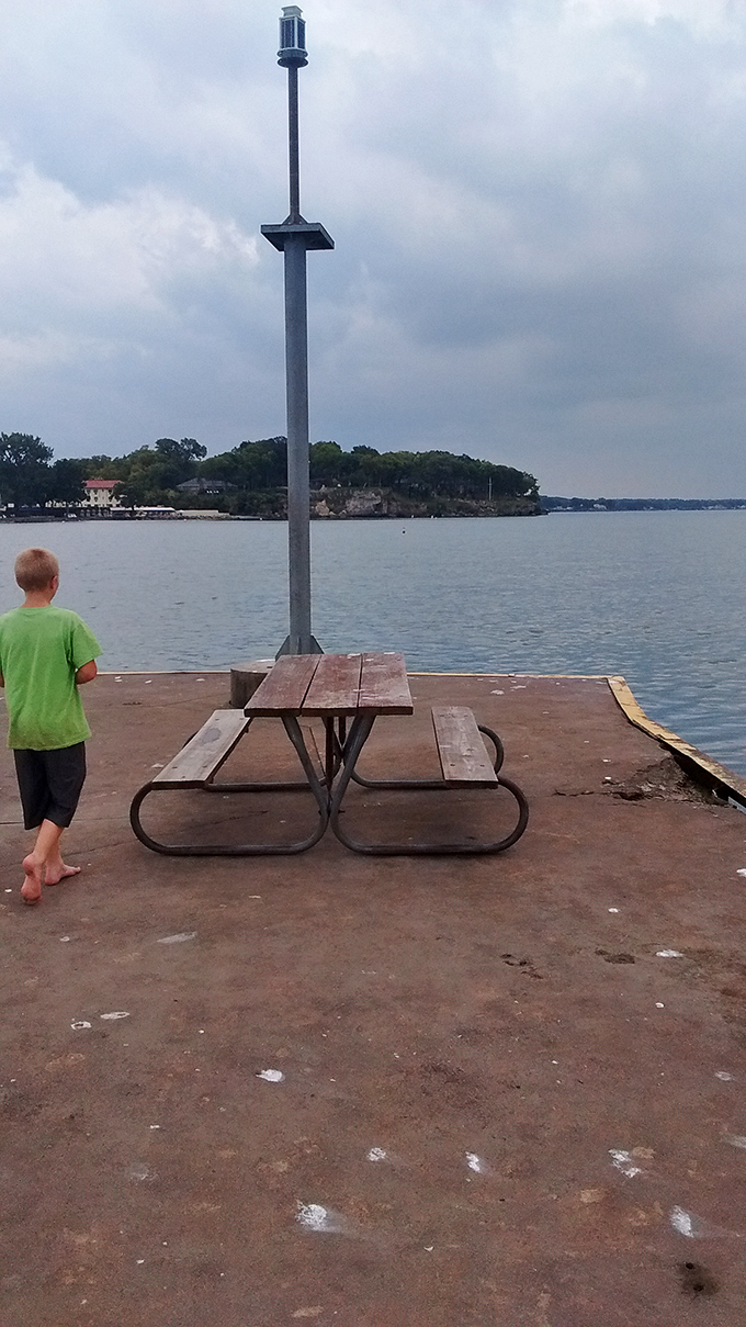 Lakeside dining doesn't get better than this—a humble picnic table offering million-dollar views that fancy restaurants can only dream about.