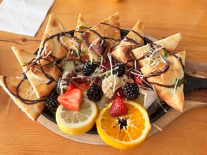 Not just any appetizer&mdash;these triangles of joy surround fresh berries and citrus with the enthusiasm of a welcoming committee.