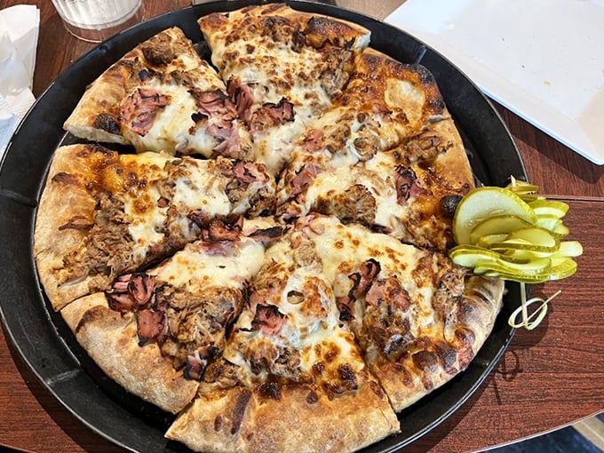 Pizza perfection doesn't need to shout. This hand-tossed beauty with gyro meat whispers, "Take another slice. You know you want to."