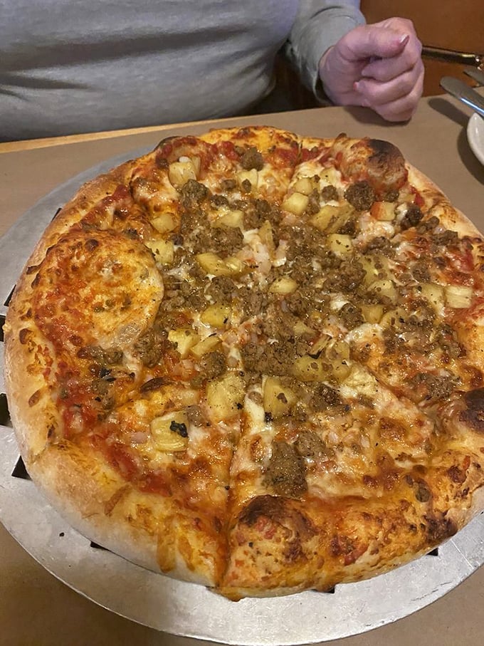 Pizza that doesn't apologize for sharing menu space with barbecue. The wood-fired crust has enough character to star in its own Netflix series.