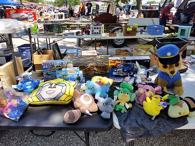 Plush Pokemon and cartoon characters silently pleading, "Take me home!" A second-hand toy display that's kryptonite for parents with young kids.