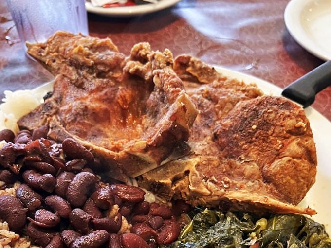 This isn't just a pork chop; it's a masterclass in comfort, served with sides that would make your grandmother nod in approval.