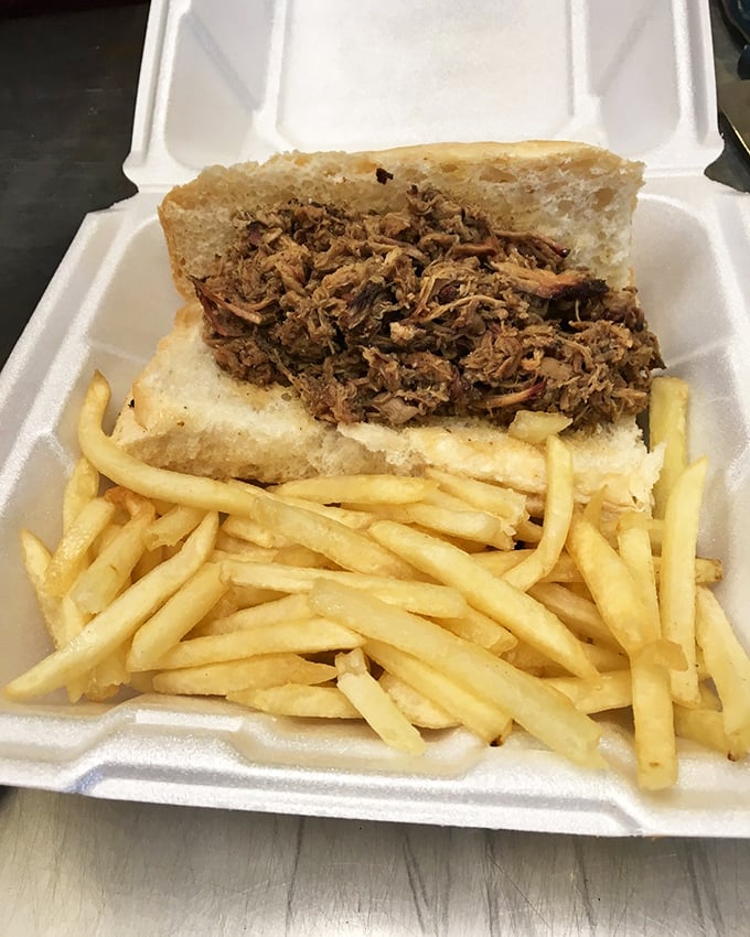 A proper pulled pork sandwich should require both hands and several napkins&mdash;this one passes the test with smoky, succulent glory.