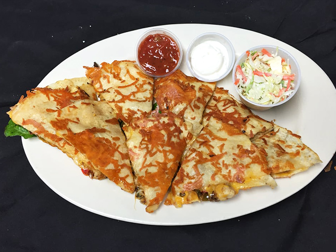 Quesadillas that could make a Mexican grandmother nod in approval – crispy, cheesy, and stuffed with Keys-fresh seafood.