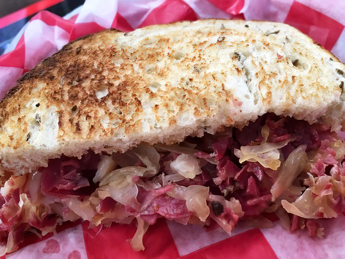 A Reuben sandwich with enough sauerkraut to make your German grandmother weep with pride. This isn't lunch&mdash;it's an edible hug.