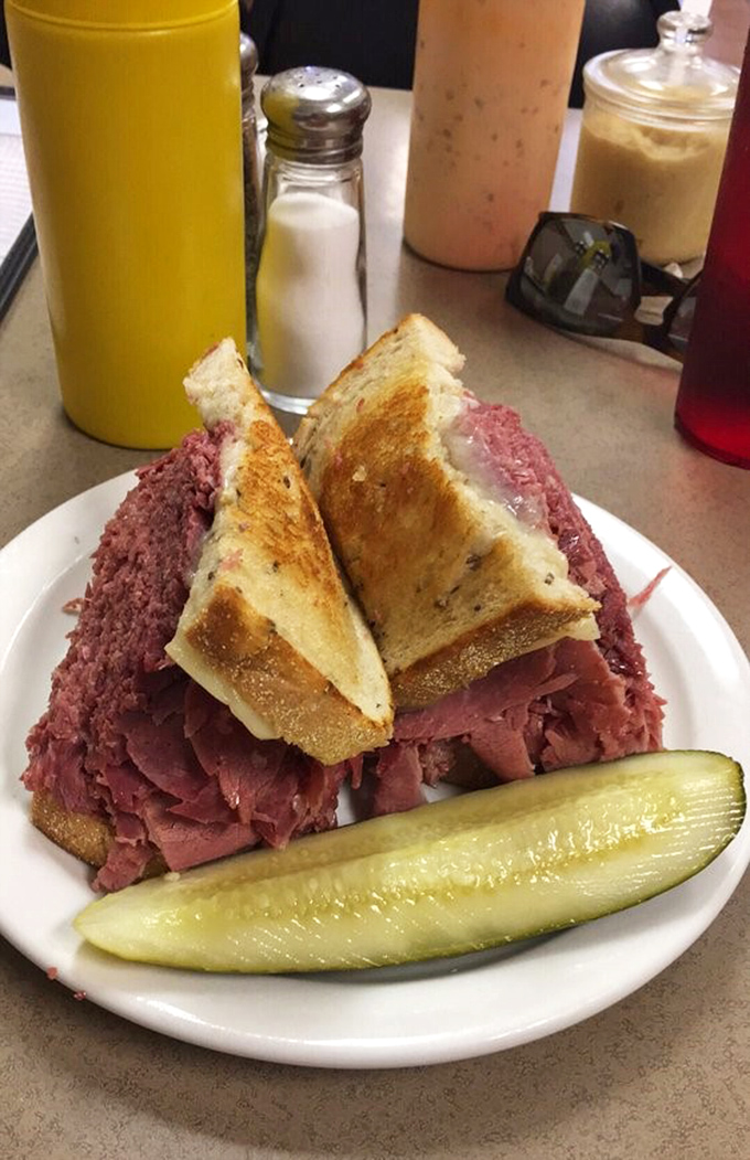 Reuben sandwiches that defy both gravity and restraint. The marriage of meat, sauerkraut, and Russian dressing creates a harmony that deserves its own symphony.