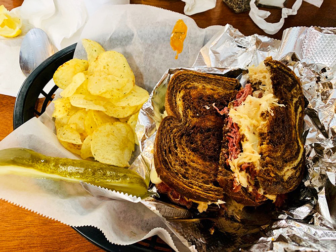 A proper Reuben shouldn't require a napkin strategy, but this beauty demands one. Perfectly grilled with melty cheese and tangy kraut.
