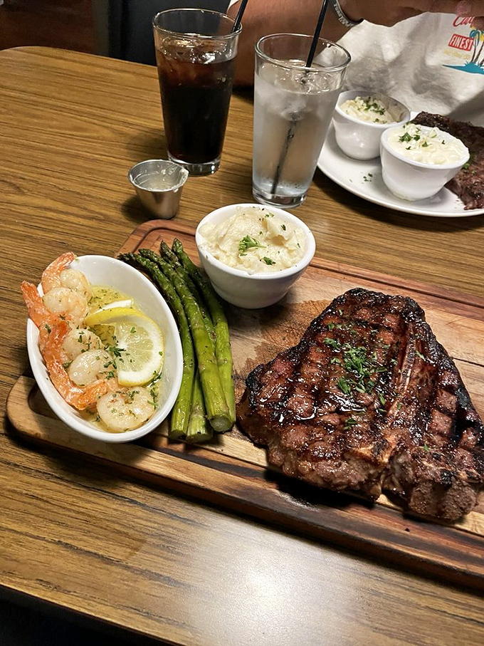 The perfect trifecta: a ribeye with steakhouse cred, buttery shrimp that practically float, and asparagus that actually makes you want to eat your vegetables.