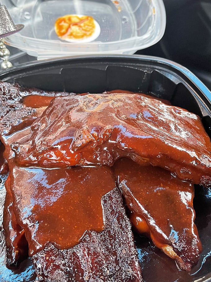 These ribs aren't just falling off the bone&mdash;they're practically jumping into your mouth. The sauce glistens like it's auditioning for a food commercial.