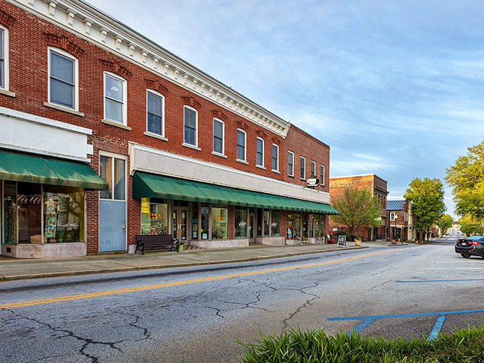 Classic storefronts with green awnings invite unhurried browsing&mdash;shopping as it was meant to be, before algorithms decided what we "might also like."