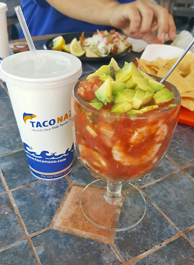 This towering shrimp cocktail brings the ocean to your table with chunks of avocado crowning the seafood celebration. 