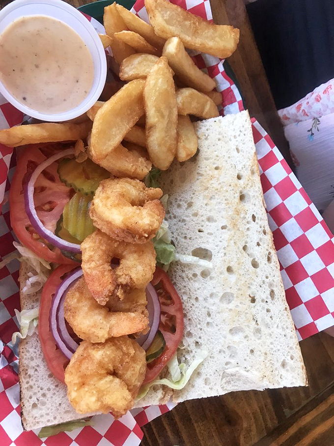 The shrimp po' boy: where crusty bread meets tender seafood in a sandwich so good you'll contemplate moving to Port St. Joe permanently.
