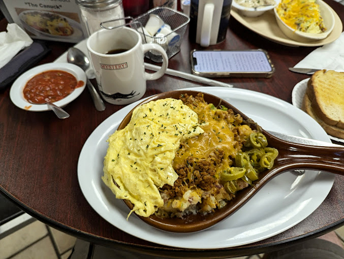 Cast iron perfection! This skillet creation combines eggs, cheese, and savory fillings in a breakfast symphony that sings to your soul.