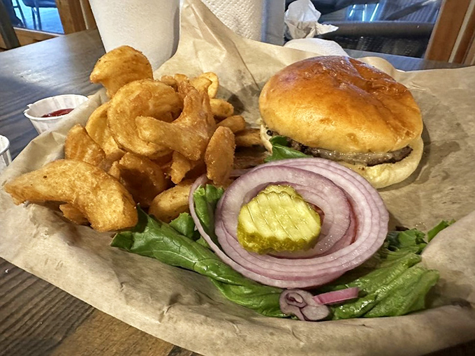 This isn't just a burger&mdash;it's a masterclass in simplicity. Crispy edges, fresh toppings, and fries that deserve their own fan club.