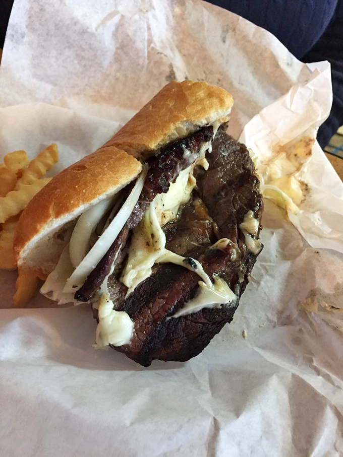 Behold the steak sandwich in all its melty, meaty glory. The kind of sandwich that makes you temporarily forget your table manners