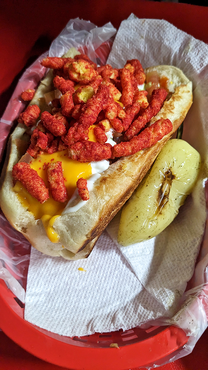 The Sonoran hot dog's rebellious cousin. When Flamin' Hot Cheetos crash the party, ordinary becomes extraordinary.