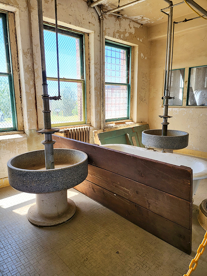 Communal washing was the norm here, with these industrial stone basins serving as a daily reminder that privacy was a privilege not afforded to the castle's young residents.