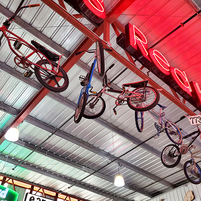 Suspended bicycles create an unexpected ceiling gallery that celebrates two-wheeled transportation through the decades.