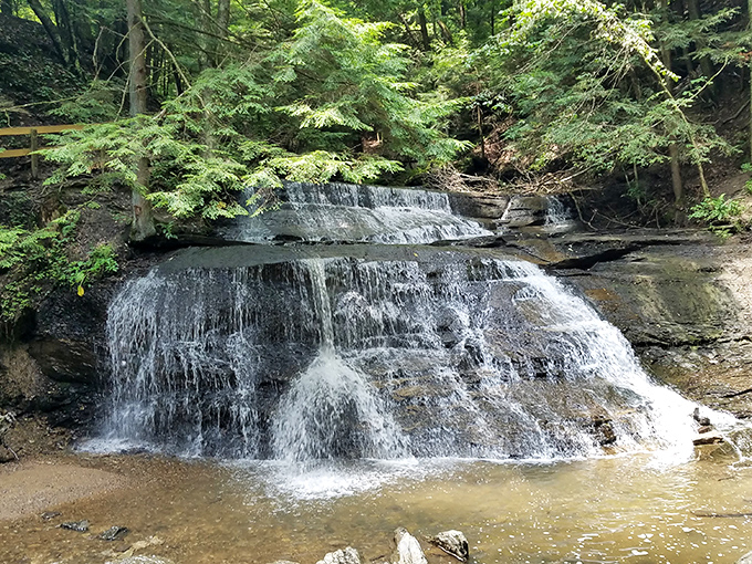 Nature's staircase of cascading water creates a meditative soundtrack that no premium meditation app could ever hope to replicate.