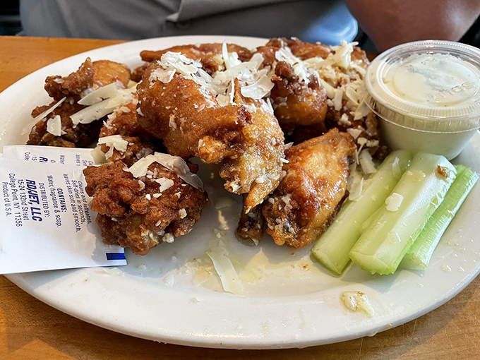 Wings that would make Buffalo proud, dusted with parmesan and served with cooling celery. A flavor explosion that demands sticky fingers.