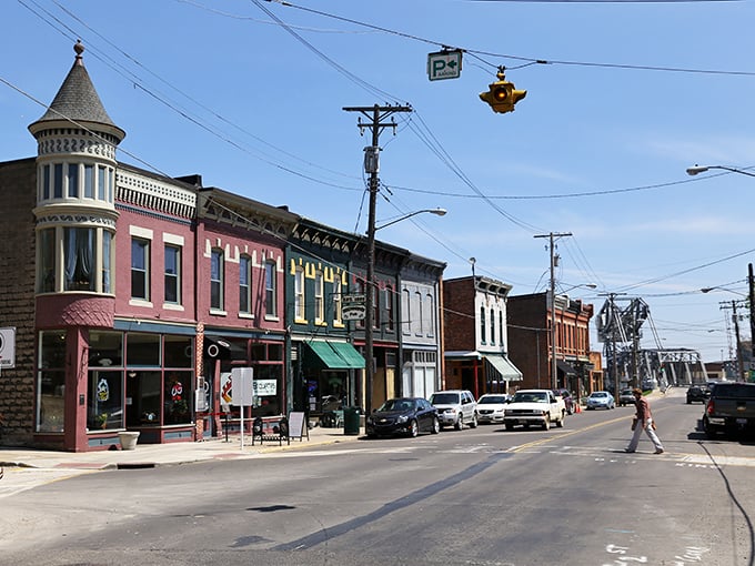Where Victorian charm meets small-town friendliness on streets lined with colorful storefronts that look like they're waiting for a Norman Rockwell painting session.