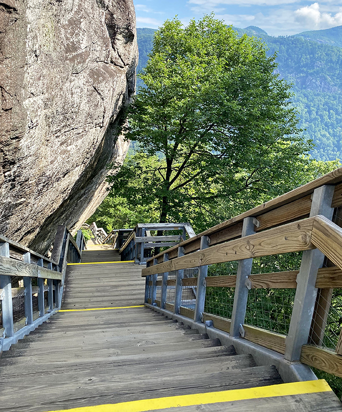 Wooden stairs zigzag down the mountainside. Your knees might complain, but your eyes will thank you!