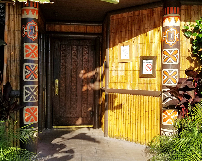 Behind these bamboo-framed doors lies a tiki paradise where steaks and tropical cocktails create the oddest but most delicious marriage.