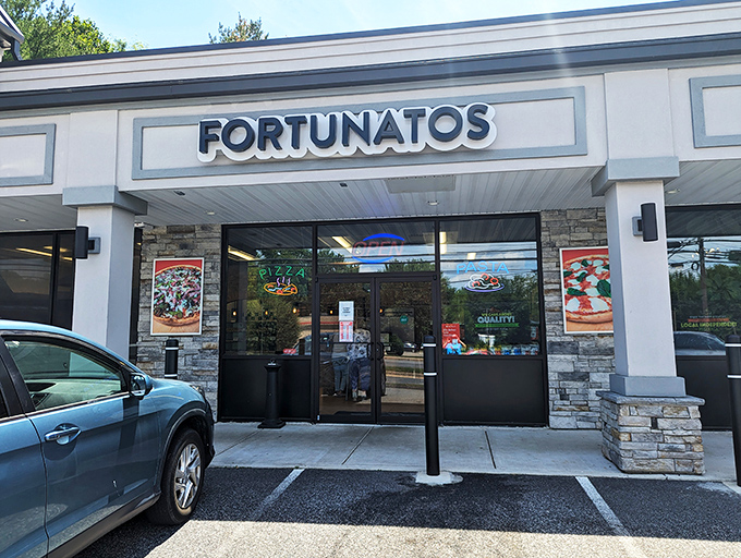 Fortunato Brothers' clean storefront hides pizza genius inside - those stone accents frame a doorway to flavor paradise.