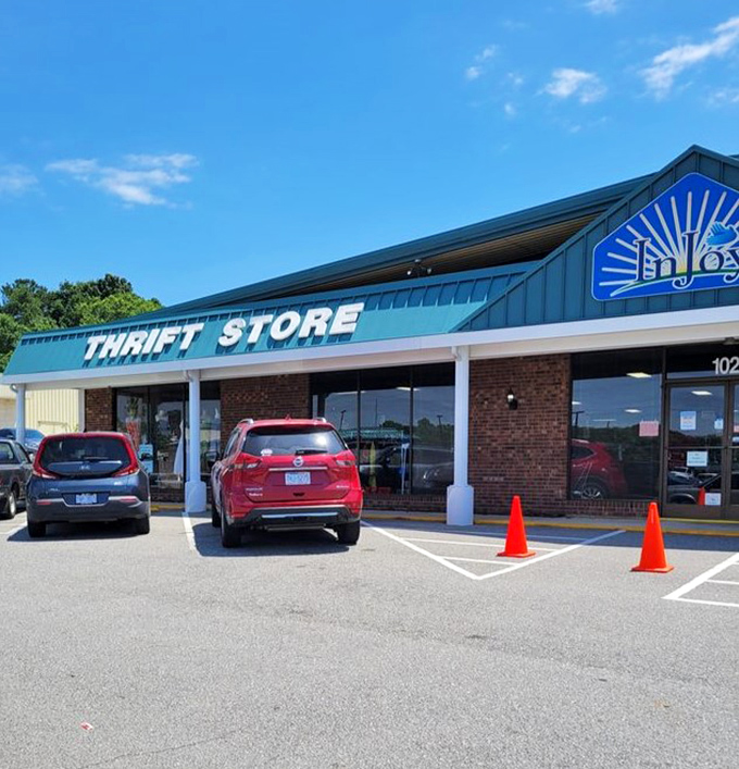 Under InJoy's bright blue awning, secondhand shopping becomes a first-class experience with neatly arranged departments.