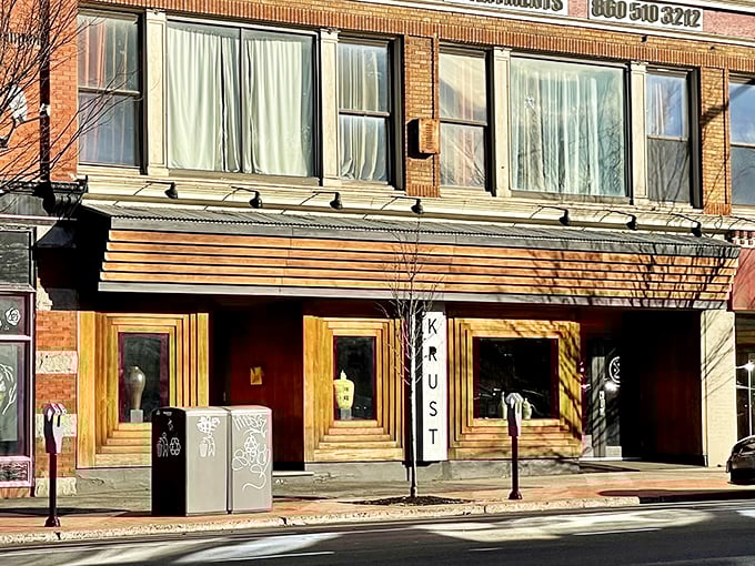 Krust Pizza & Bourbon Bar: Behind that sleek wooden fa&ccedil;ade lies the perfect marriage of artisanal pizza and carefully curated bourbon.