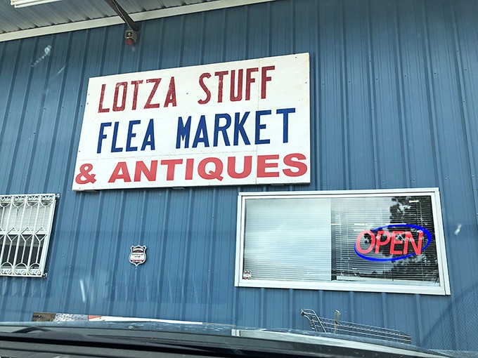 "Lotza Stuff" indeed! This blue metal building houses treasures that would make American Pickers drool with envy.